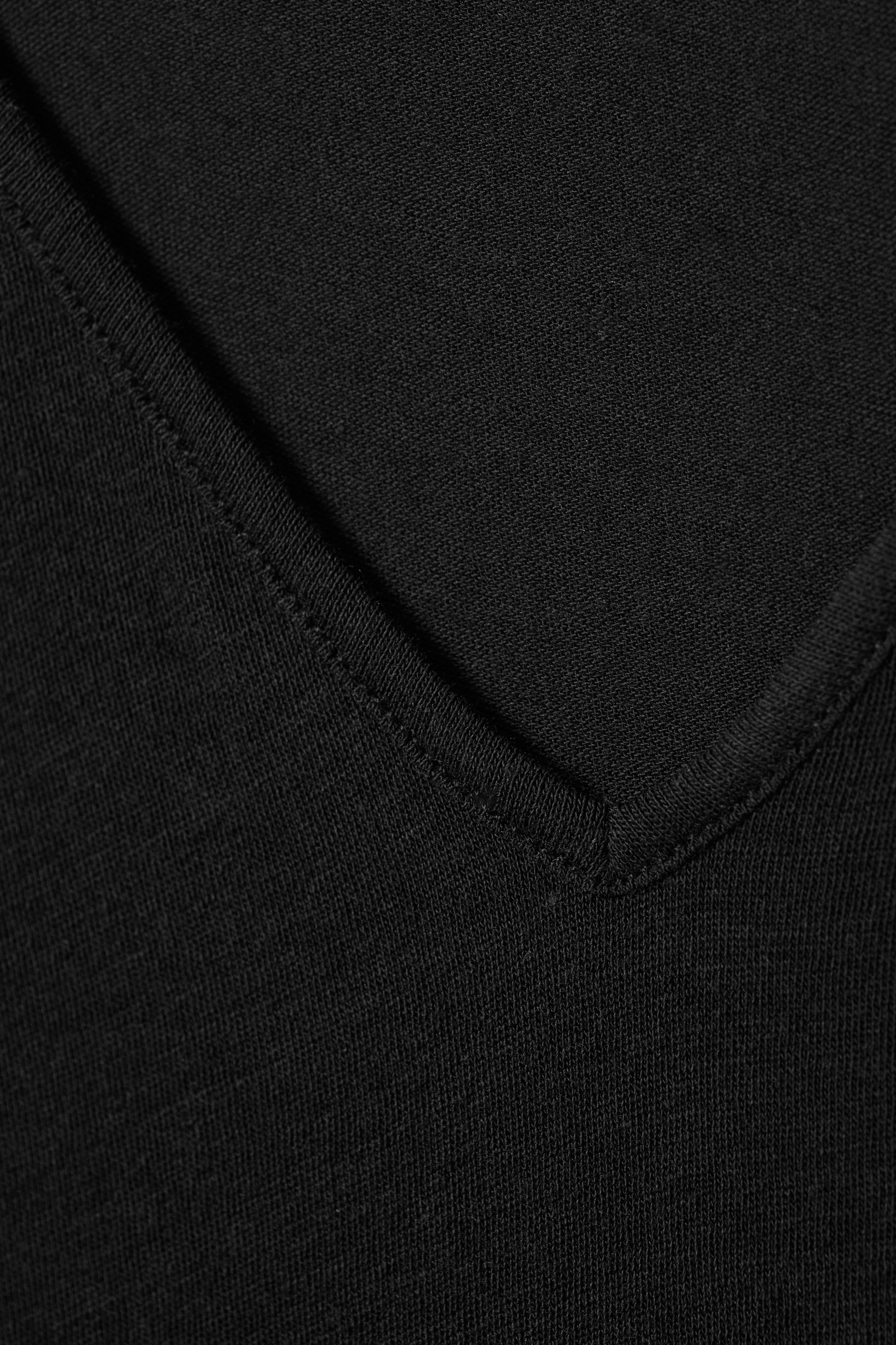 Langærmet top med dyb V-udskæring - Sort - DAME | H&M DK