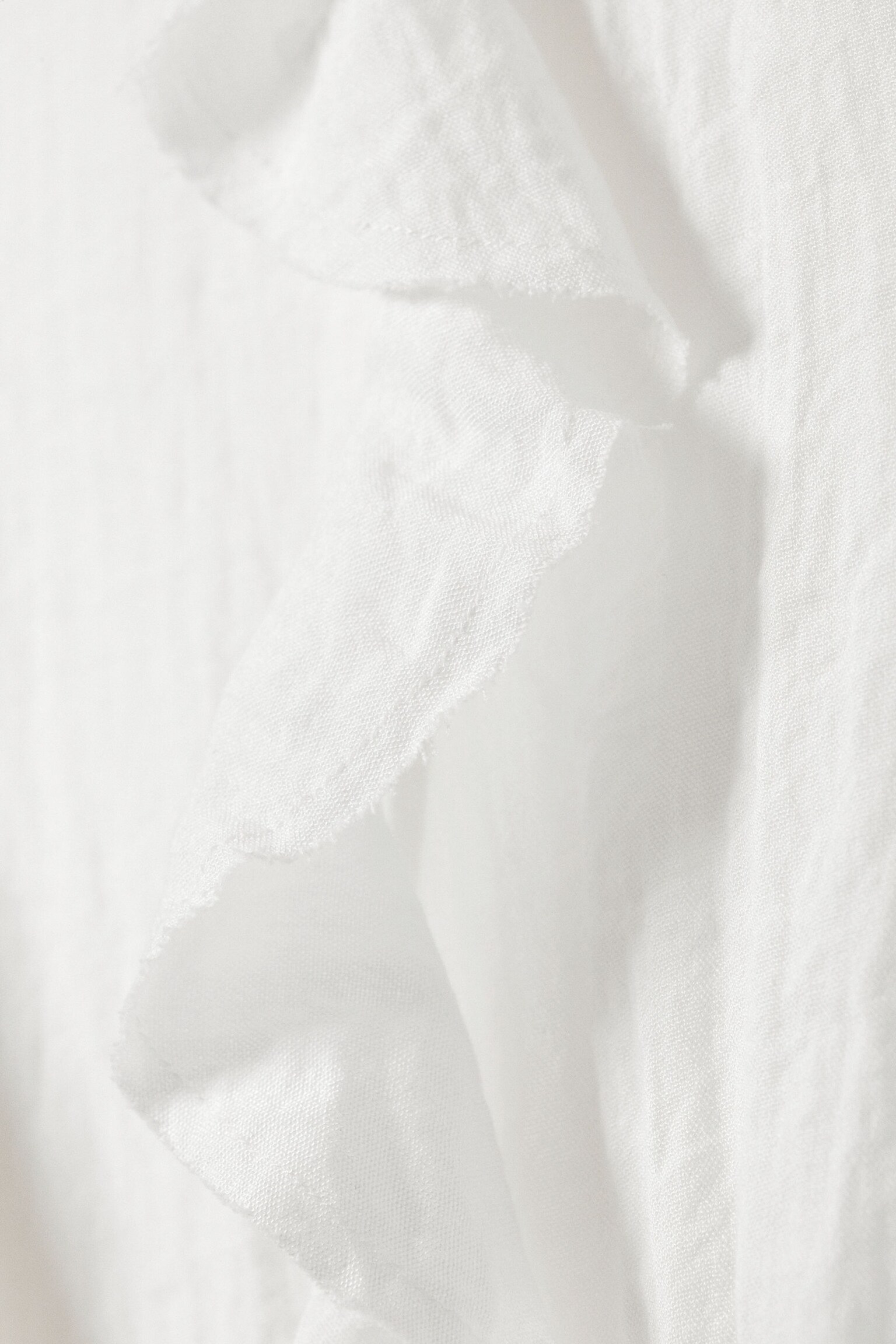 knyt-topp med volang - Vit | Weekday SE